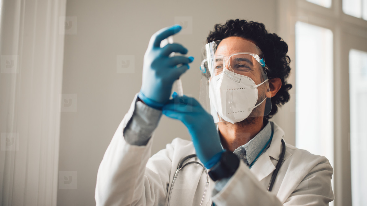 Doctor preparing covid-19 vaccine injection stock photo (231629 ...